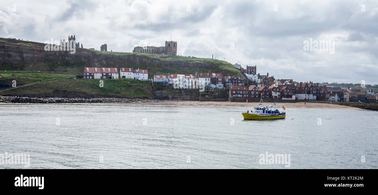 The harbour and east cliff at Whitby,North Yorkshire,England,UK Stock ...