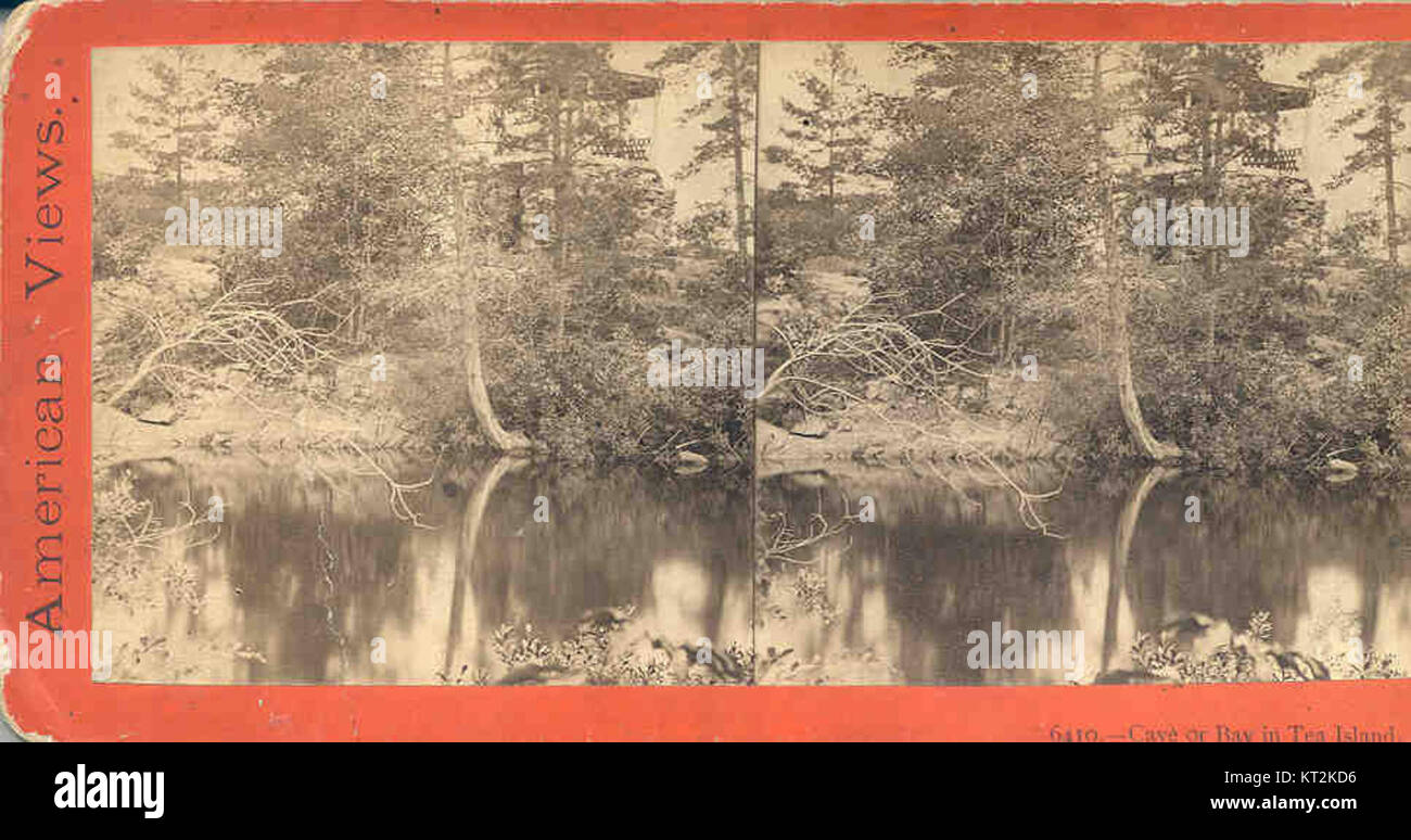 This photograph captures a cave or bay on Tea Island, showcasing the ...