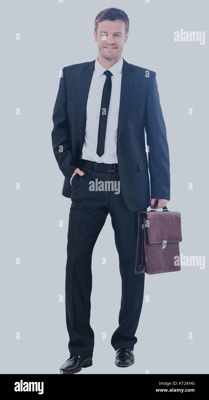 Portrait of an elegant handsome business man with suitcase on w Stock ...