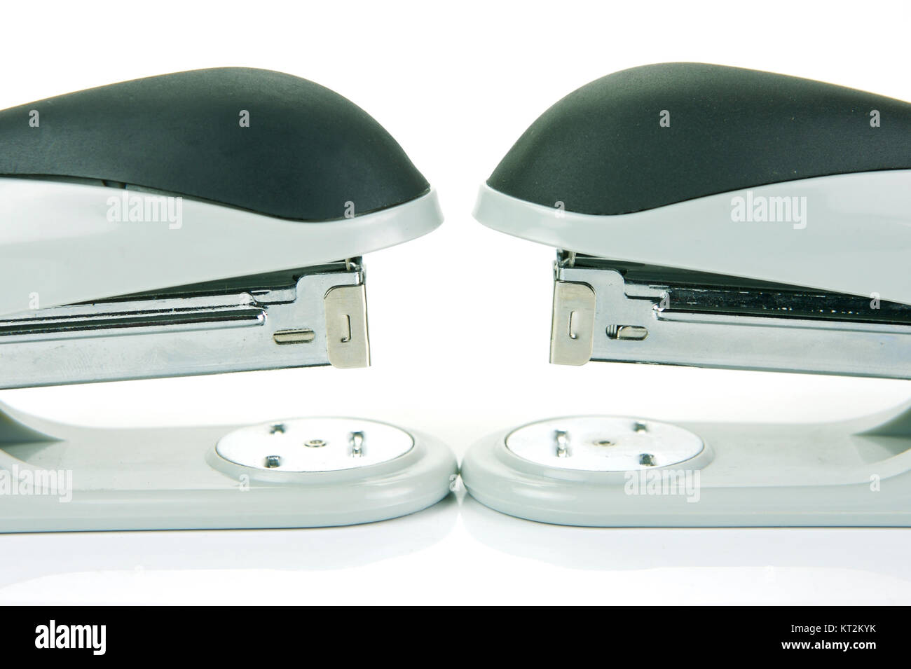 Staplers isolated against a white background Stock Photo - Alamy