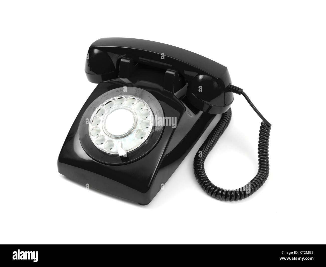 A vintage rotary telephone on a desk Stock Photo - Alamy
