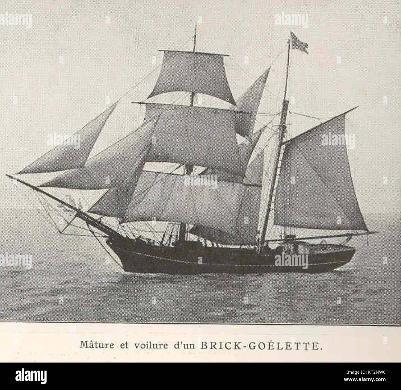 This historical image depicts a mature brick-built gaff rig schooner, a ...