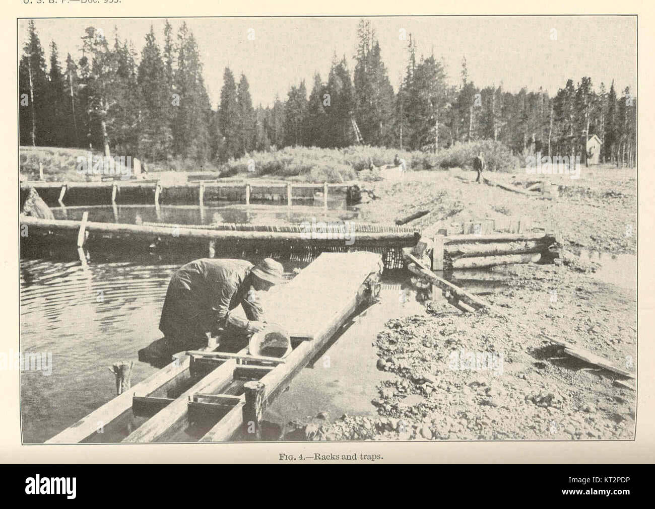 A photograph labeled '37628 Racks and traps', depicting various fishing ...
