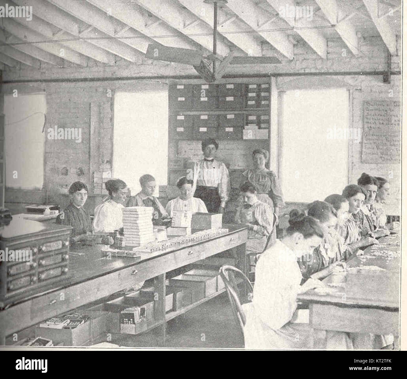 38872 Interior of Button Factory Sorting the buttons, sewing them on ...