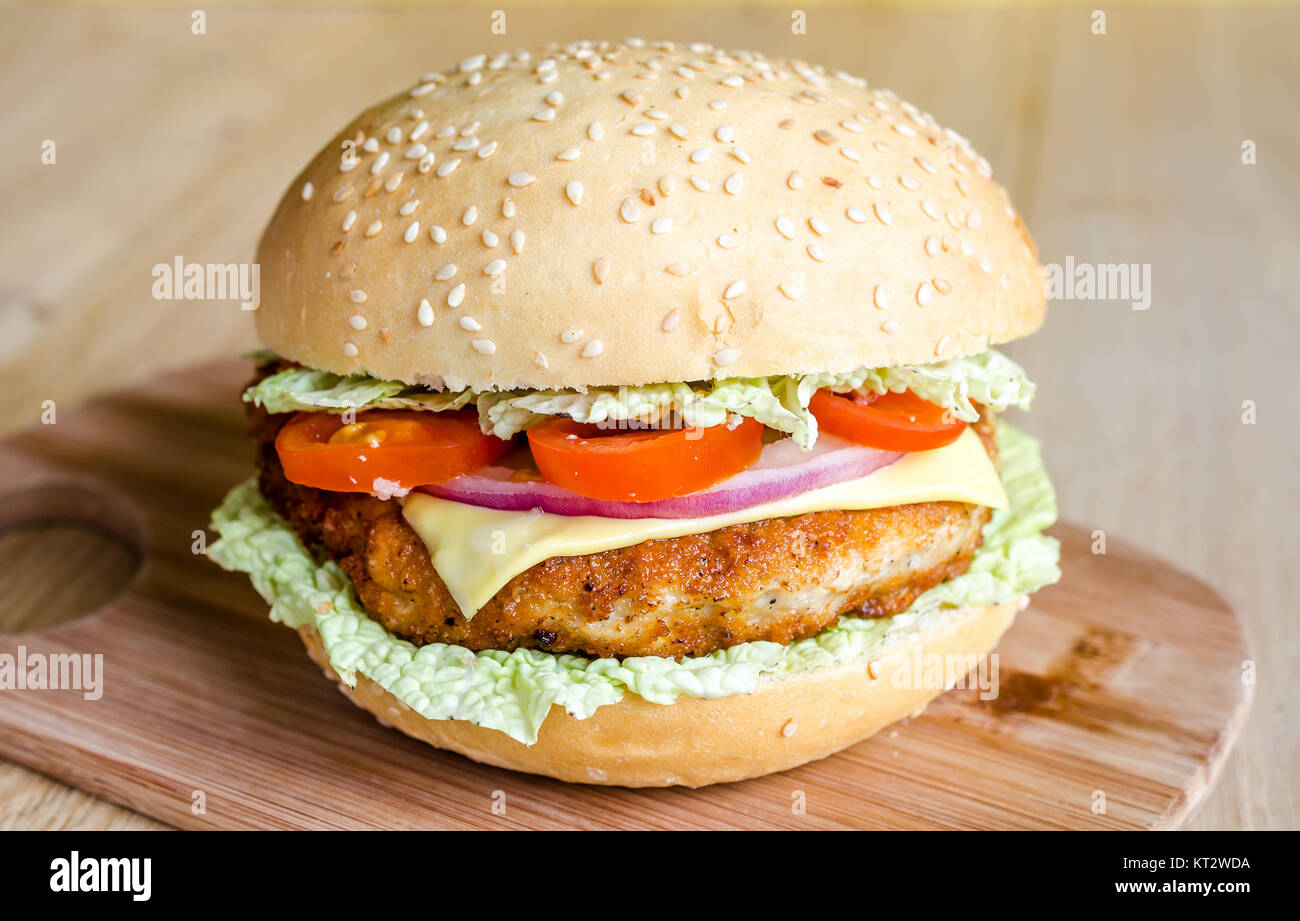 Triangle wholewheat-bun hamburger Stock Photo - Alamy