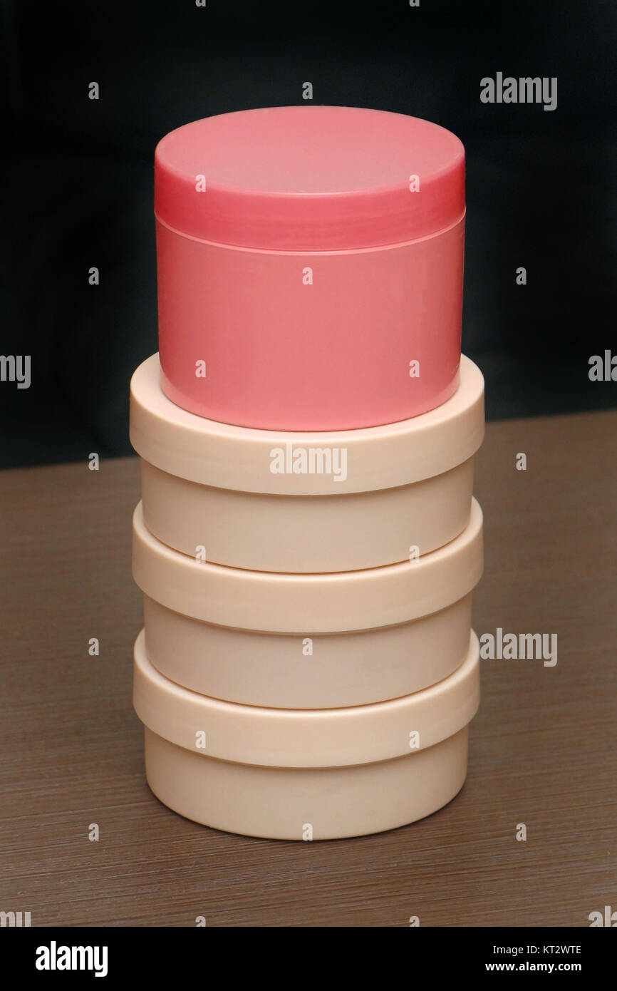 Plastic cream containers Stock Photo - Alamy