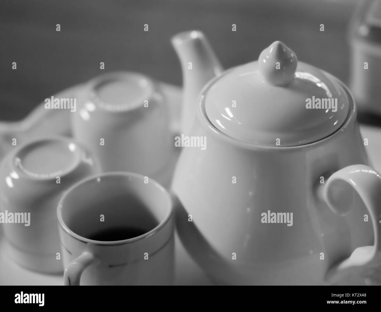 Teapot and cups Black and White Stock Photos & Images - Alamy