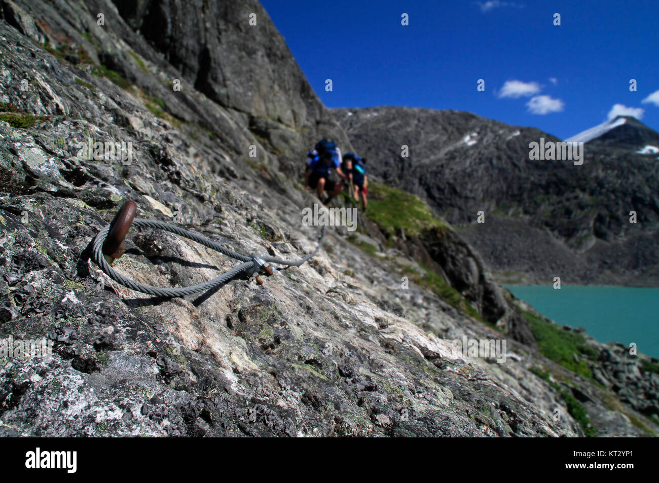 Hiking along a steep mountain side in Norway Stock Photo - Alamy