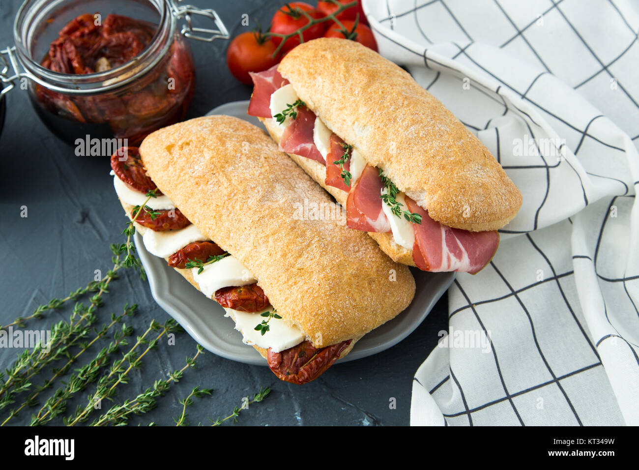 assorted sandwiches. sandwich Caprese with mozzarella and sun-dried ...
