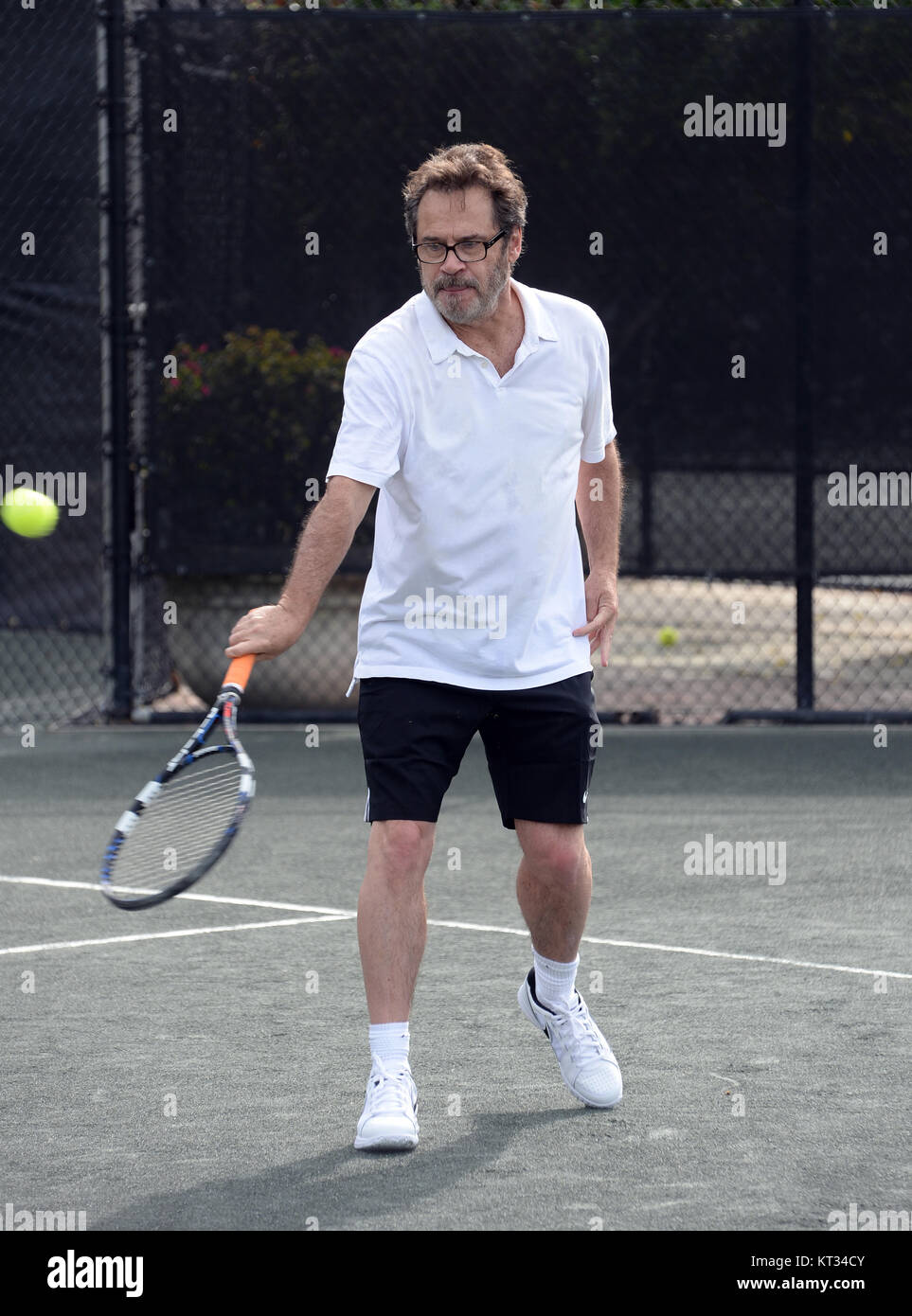 BOCA RATON, FL - NOVEMBER 20: Dennis Miller playing Tennis at The Boca ...