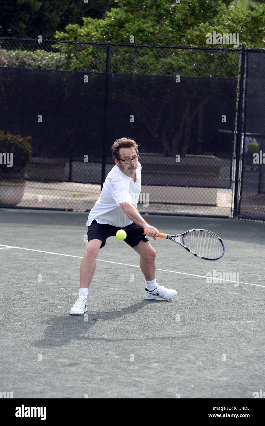 BOCA RATON, FL - NOVEMBER 20: Dennis Miller playing Tennis at The Boca ...