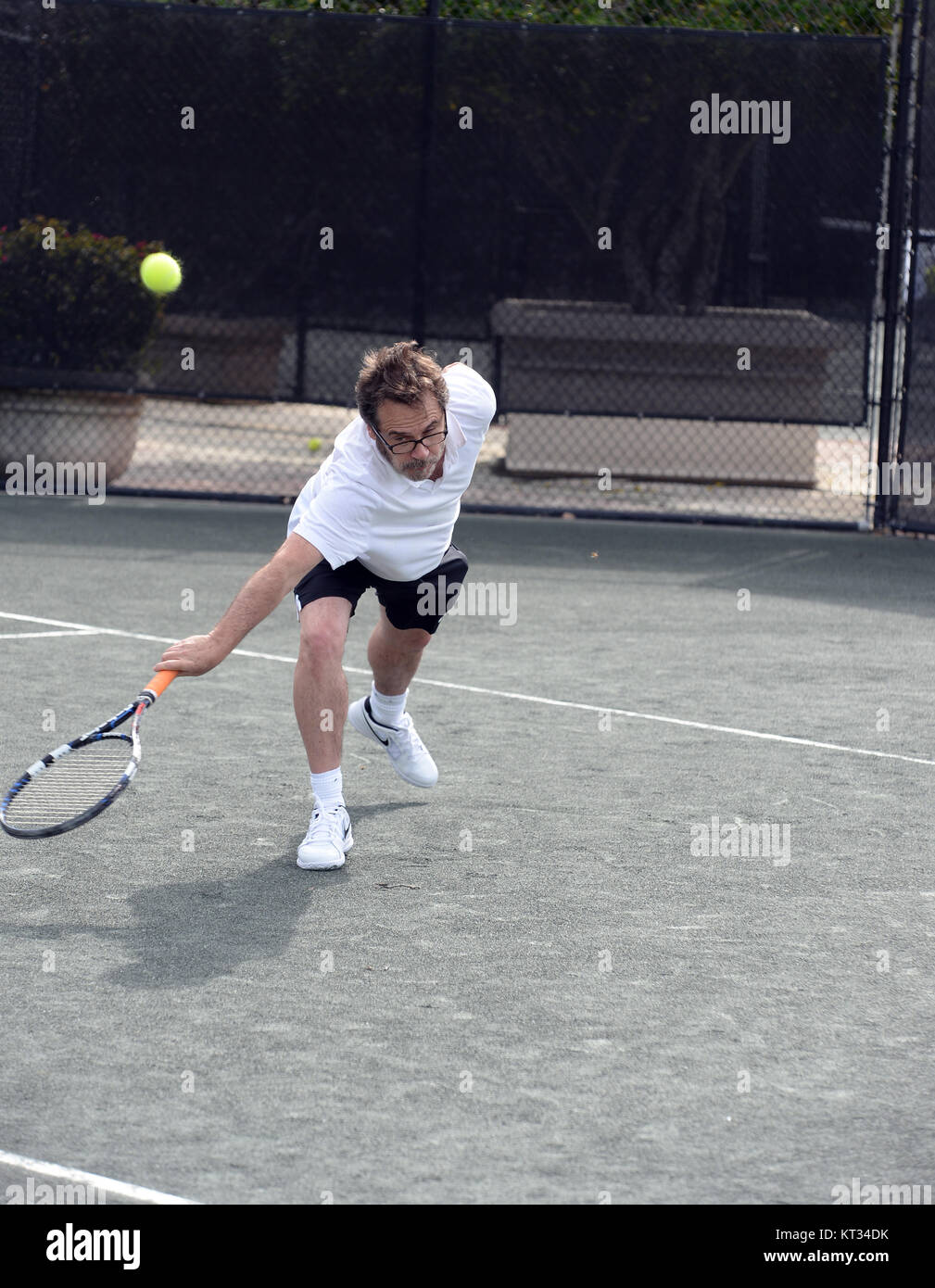 BOCA RATON, FL - NOVEMBER 20: Dennis Miller playing Tennis at The Boca ...
