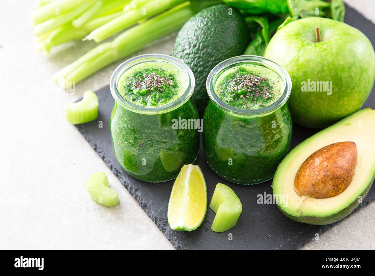 Blended green smoothie with ingredients. Superfood, detox and healthy ...