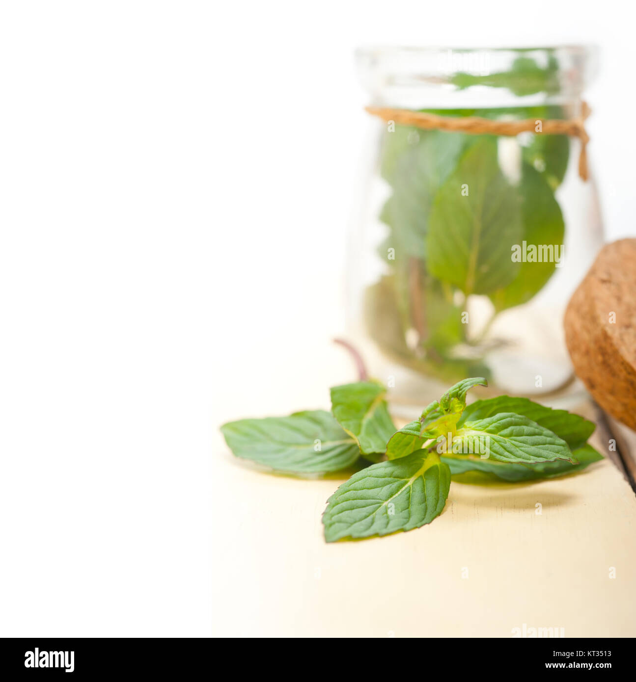 fresh mint leaves on a glass jar Stock Photo - Alamy