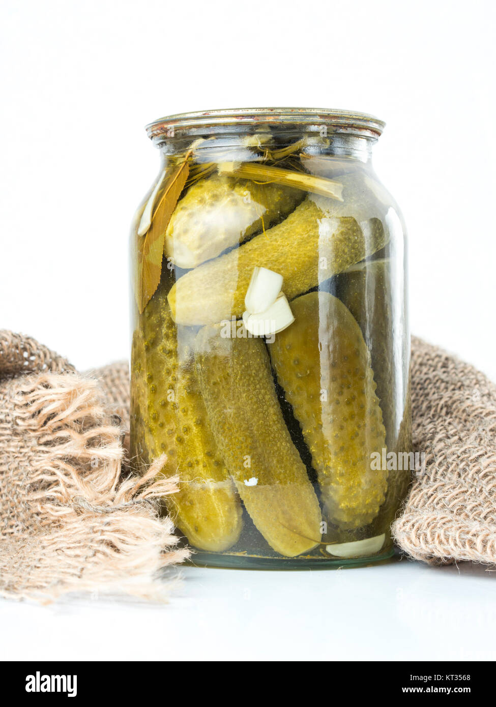 Pickles in glass jar isolated on white Stock Photo - Alamy