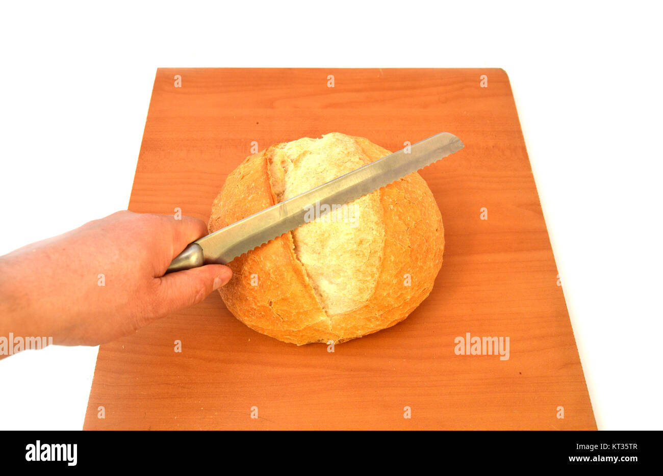 cut bread with knife Stock Photo - Alamy