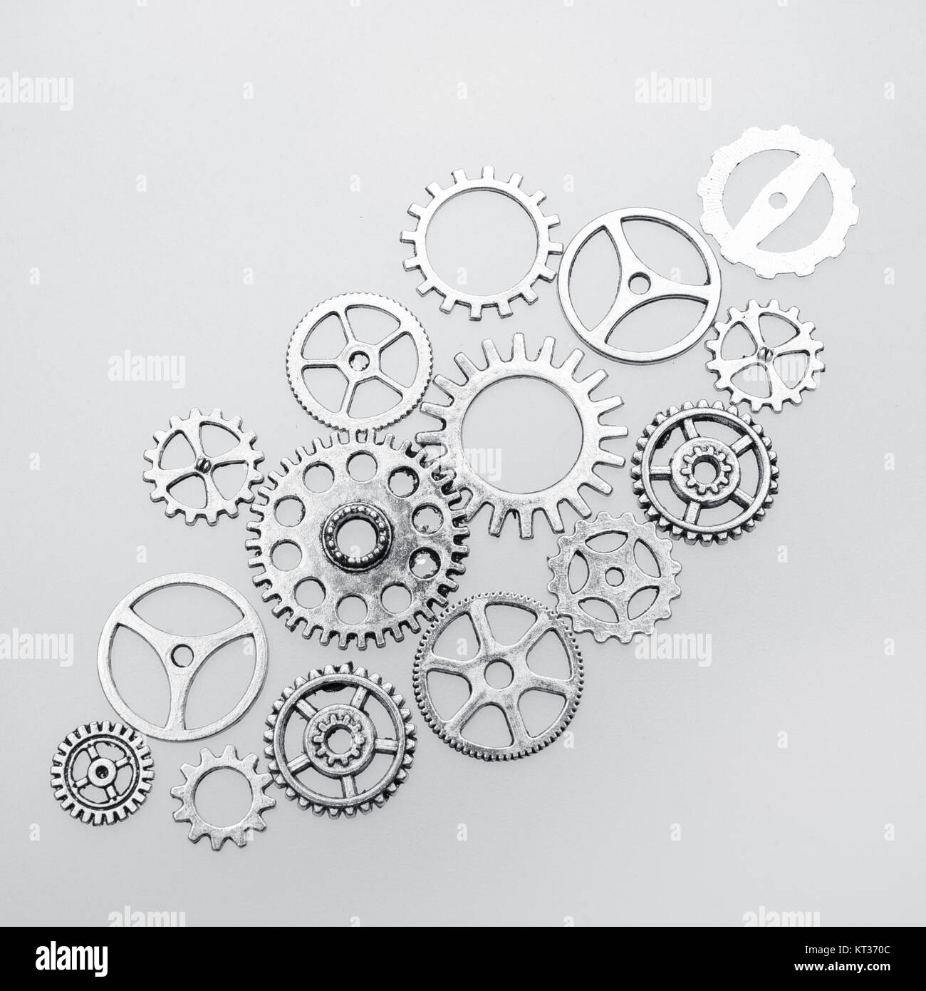 metallic gears background. Closeup of metal cog gears Stock Photo - Alamy