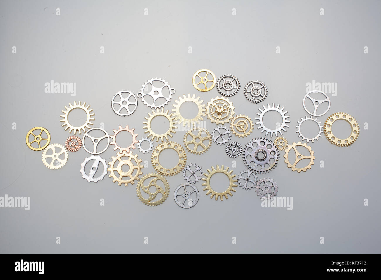 metallic gears background. Closeup of metal cog gears Stock Photo - Alamy