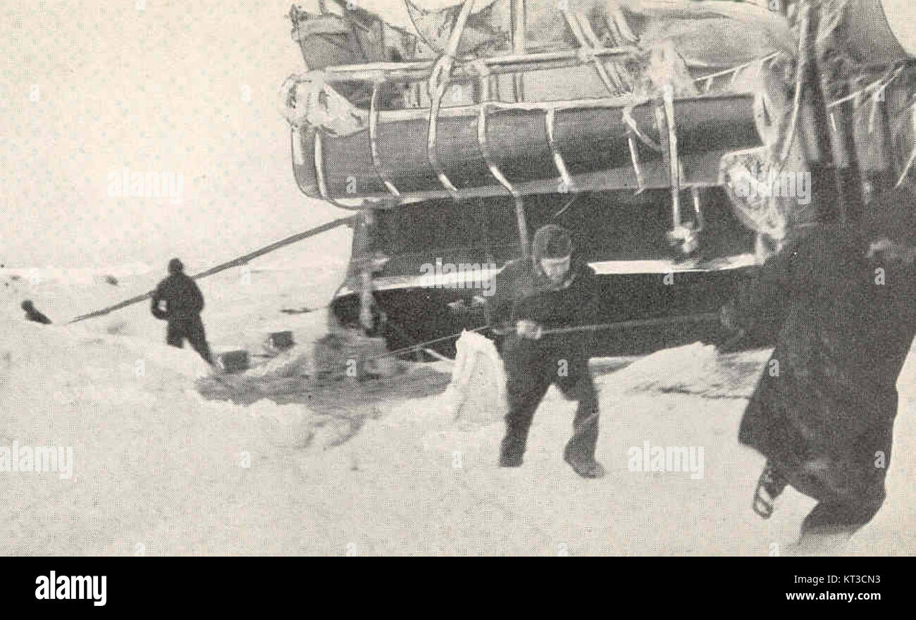 This image depicts the process of hauling a dredge through a hole in ...