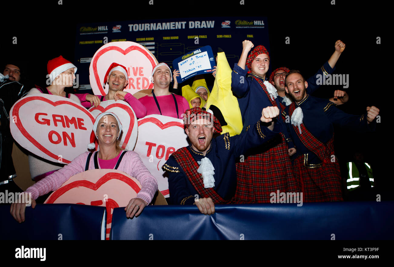 Darts fans soak up the atmosphere in the fan zone before the start of ...