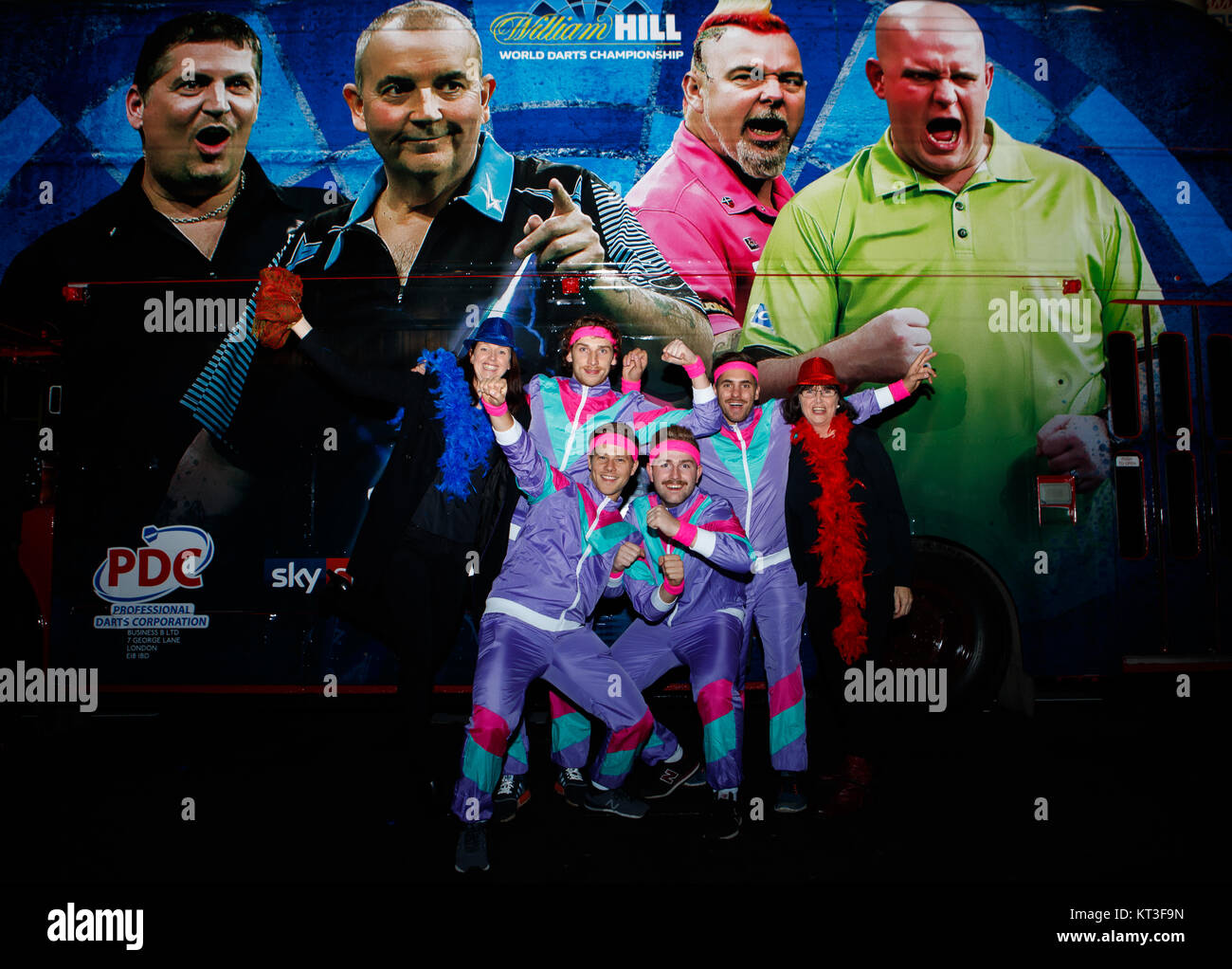 Darts fans soak up the atmosphere in the fan zone before the start of ...