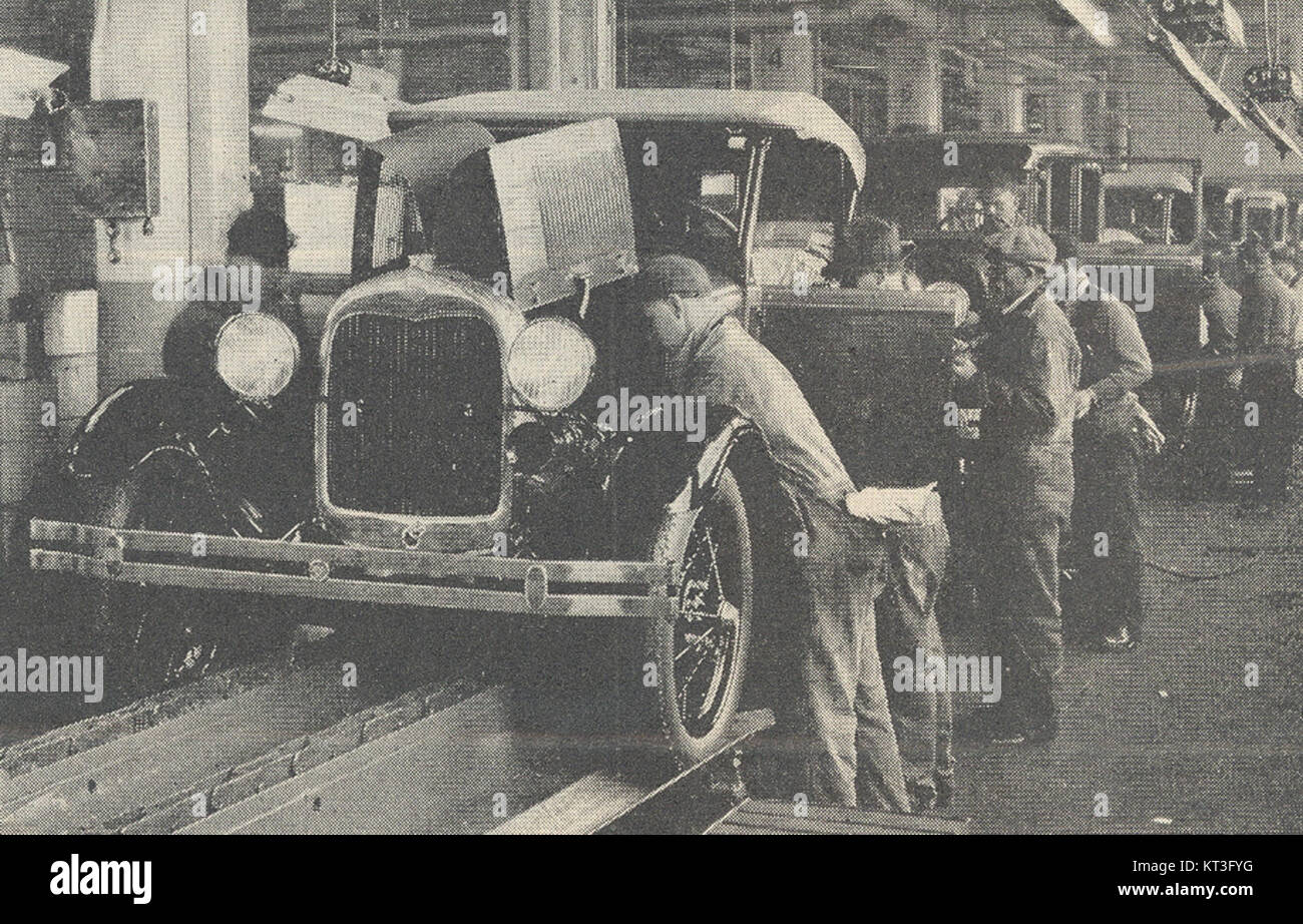 An image depicting the assembly line at a Ford Motor Company factory ...