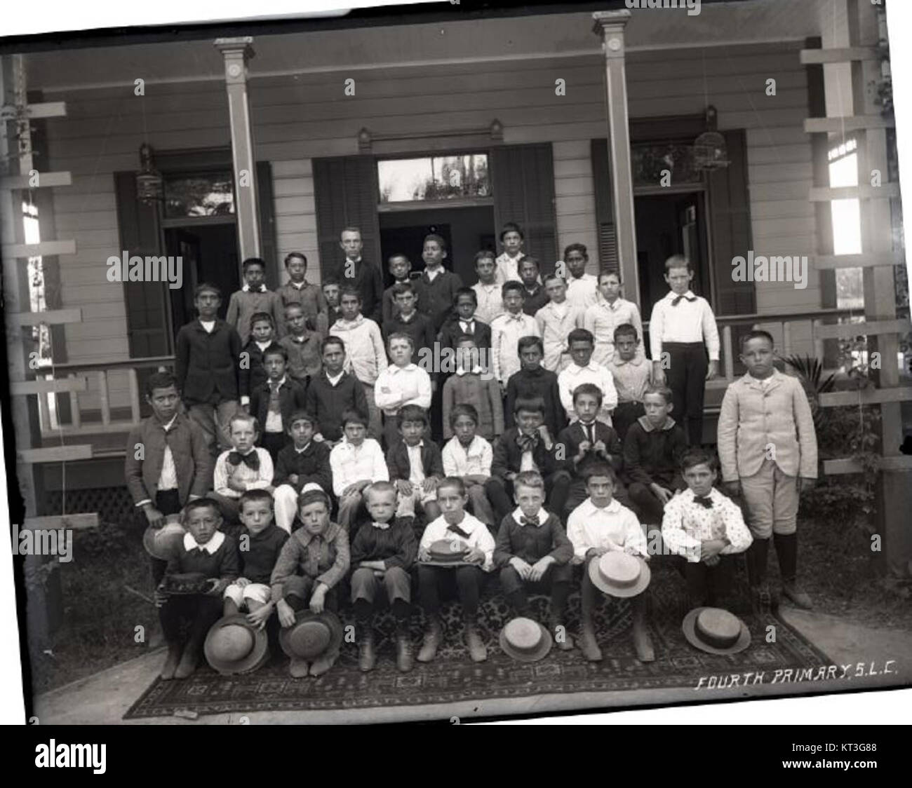 This undated photograph shows a class of fourth-grade students at Saint ...