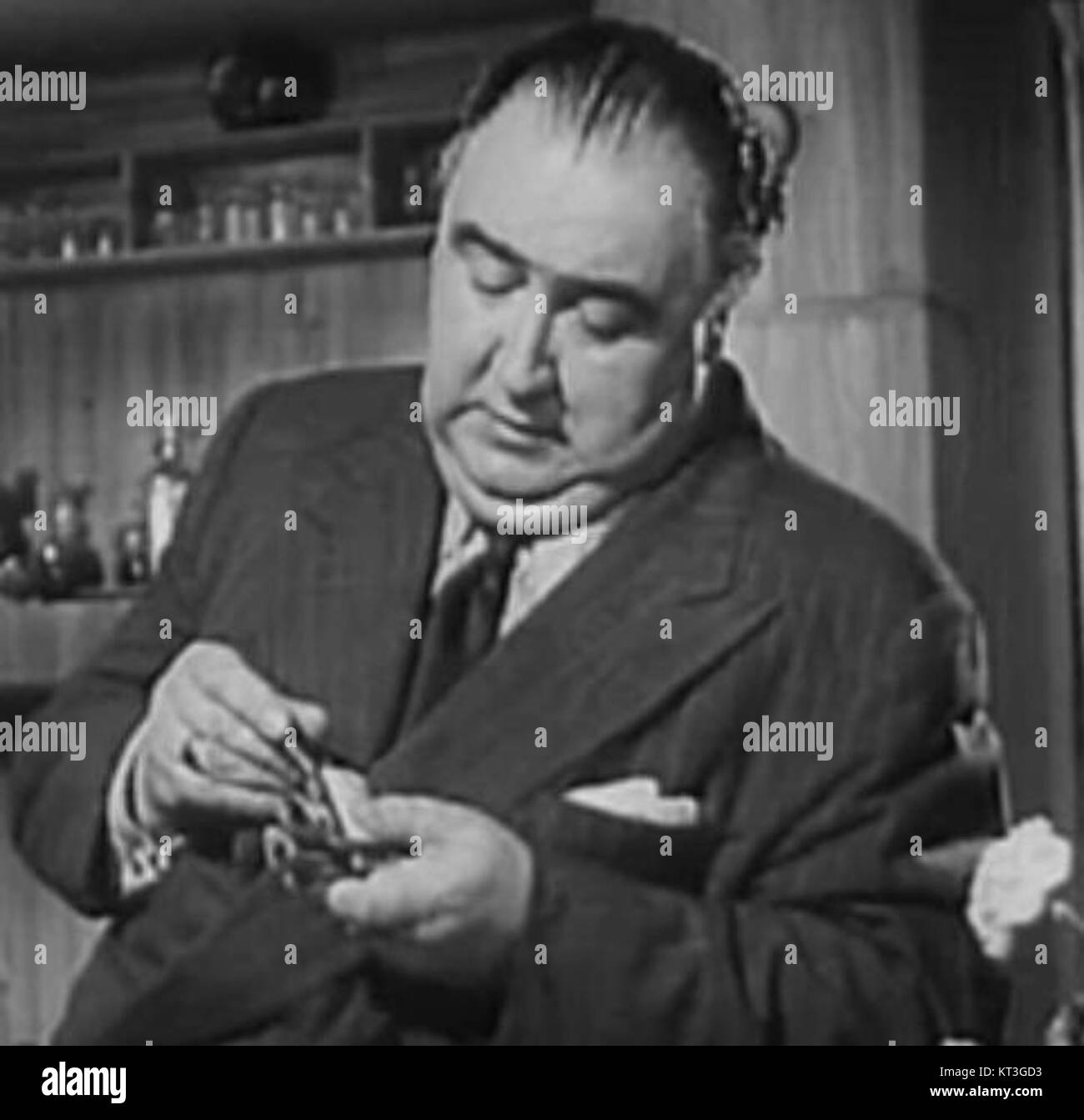 Francis L. Sullivan portrays a police officer in the 1952 film 'Behave ...