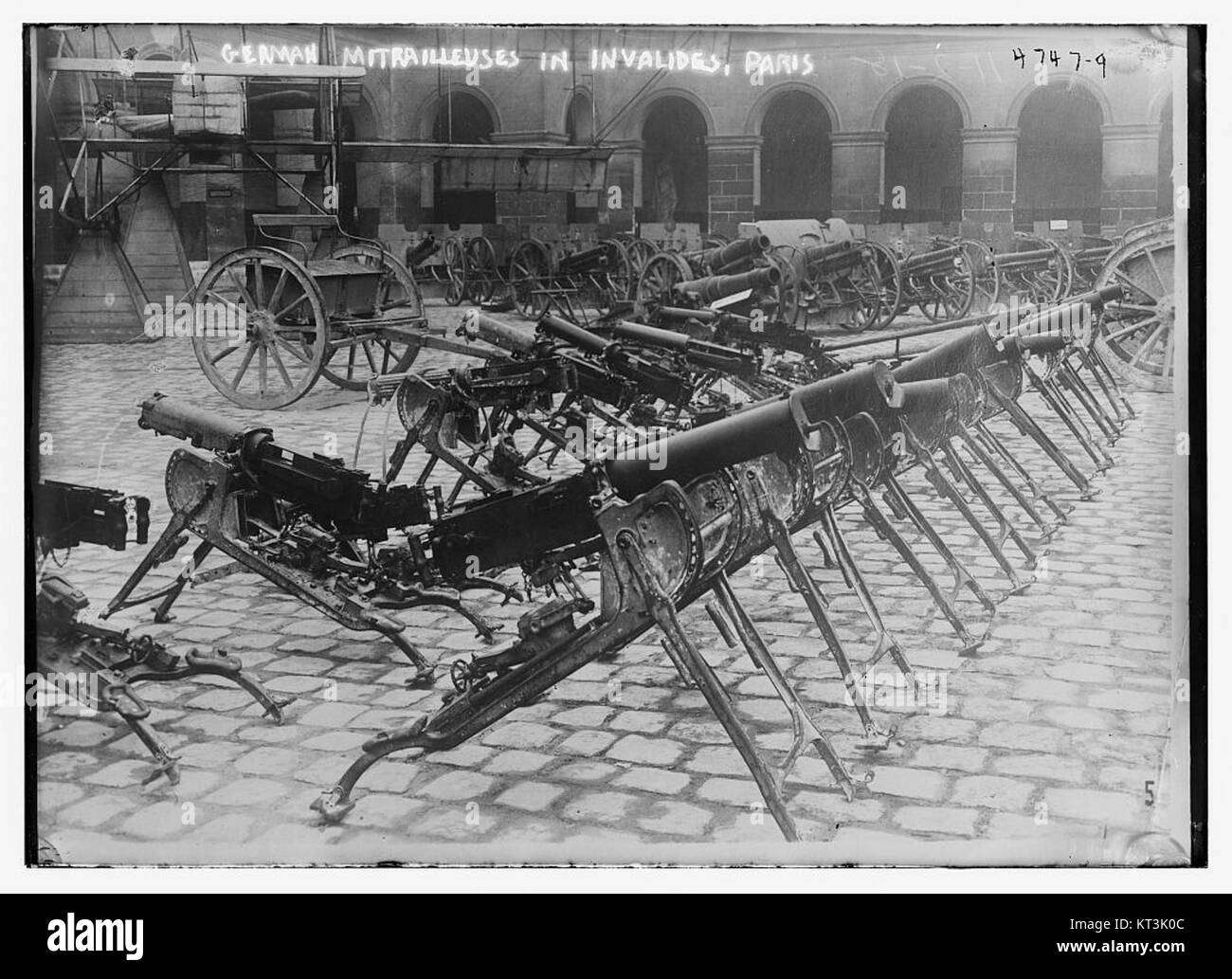 The image depicts German Mitrailleuses, or machine guns, displayed in ...