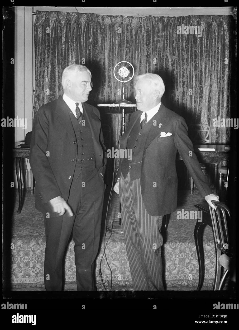 This image captures a moment of discussion between Governor Albert C ...