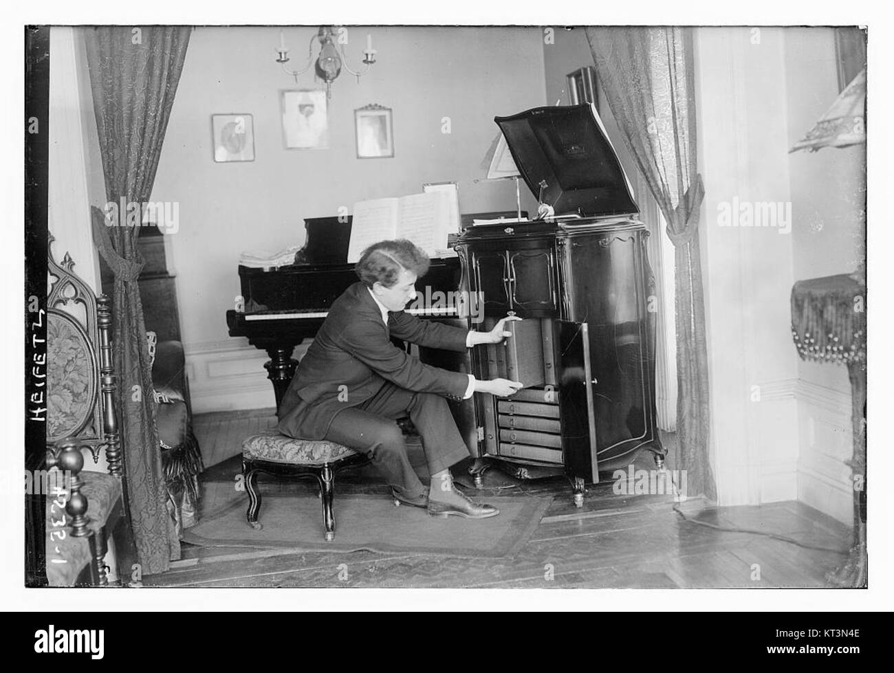 A portrait of the renowned violinist Jascha Heifetz, known for his ...