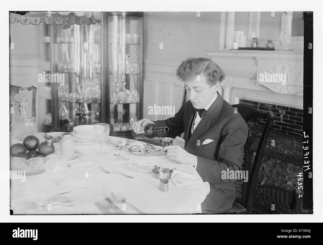 Jascha Heifetz, a renowned violinist, is captured in this image ...