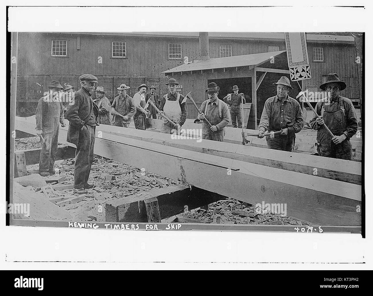 This image shows a person hewing timber for a ship, highlighting the ...