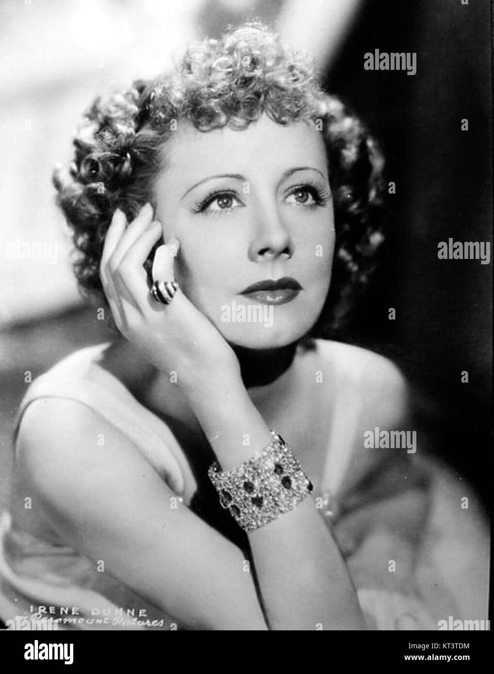 This promotional image features actress Irene Dunne, an iconic figure ...