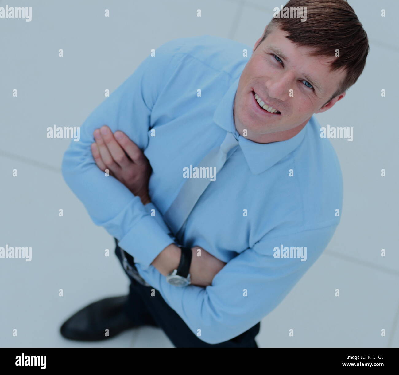 Happy middle aged man standing on isolated white background an Stock ...