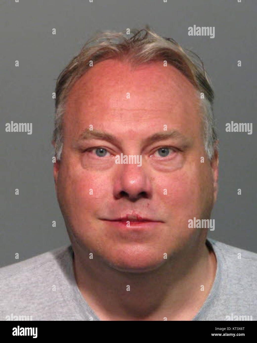 A mugshot photograph of Jim Greer, an individual known for his ...