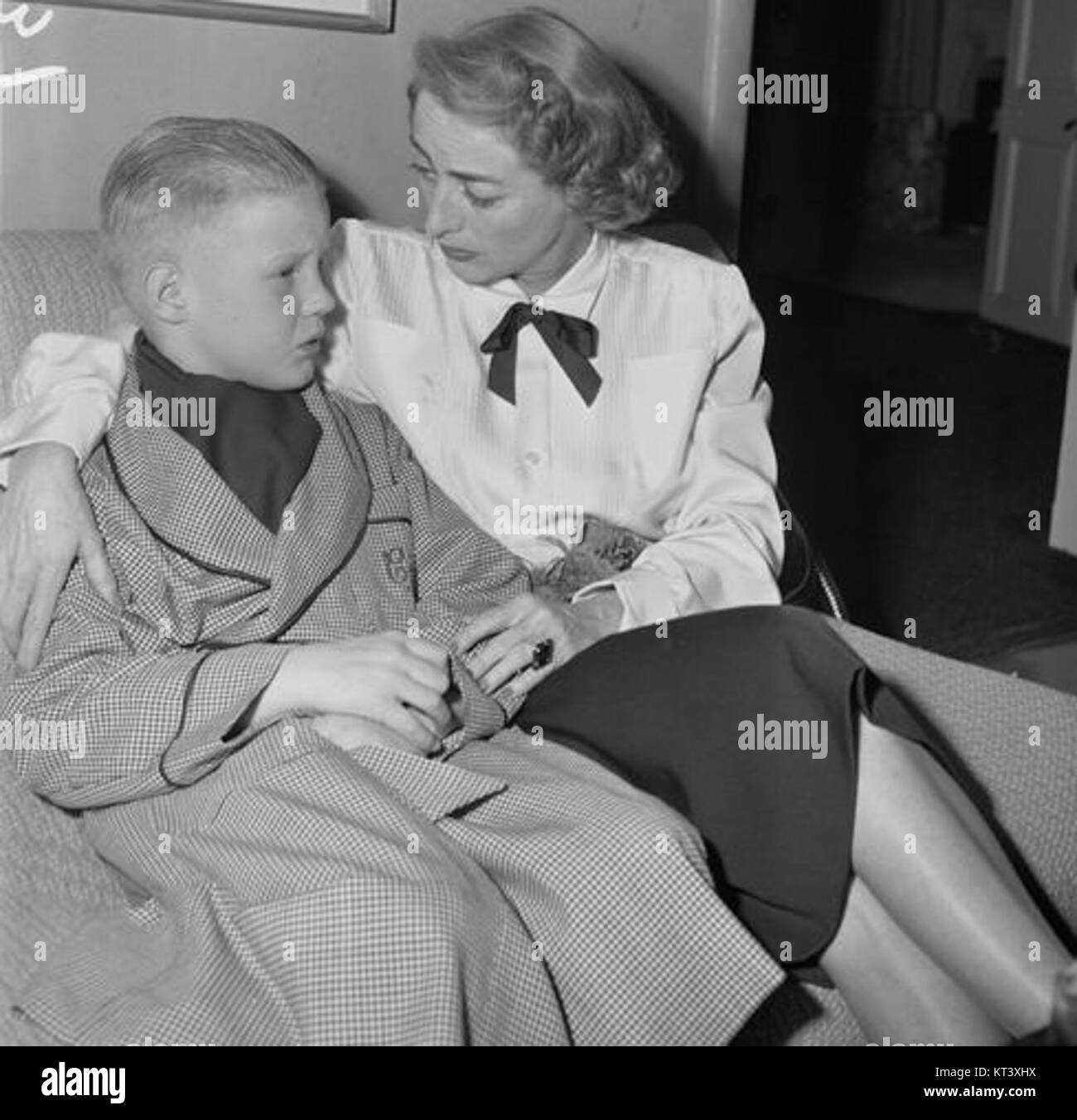 An image of actress Joan Crawford with her adopted son, Christopher ...