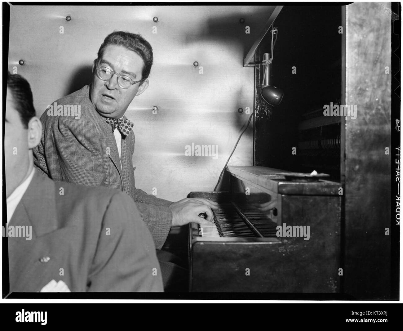 This photograph features jazz pianist Joe Sullivan, taken in New York ...