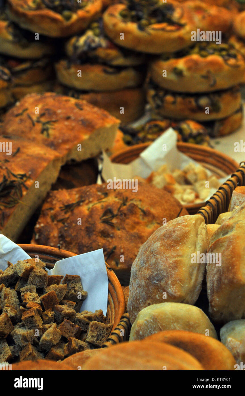 a selection of artisan breads cooked and baked at a stall on borough ...