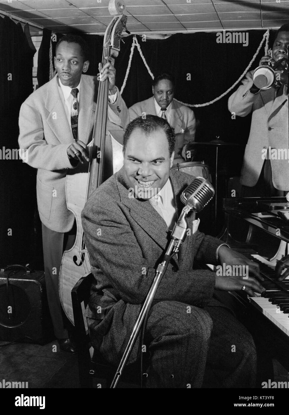 A photograph by William P. Gottlieb of John Levy and Phil Moore, two ...