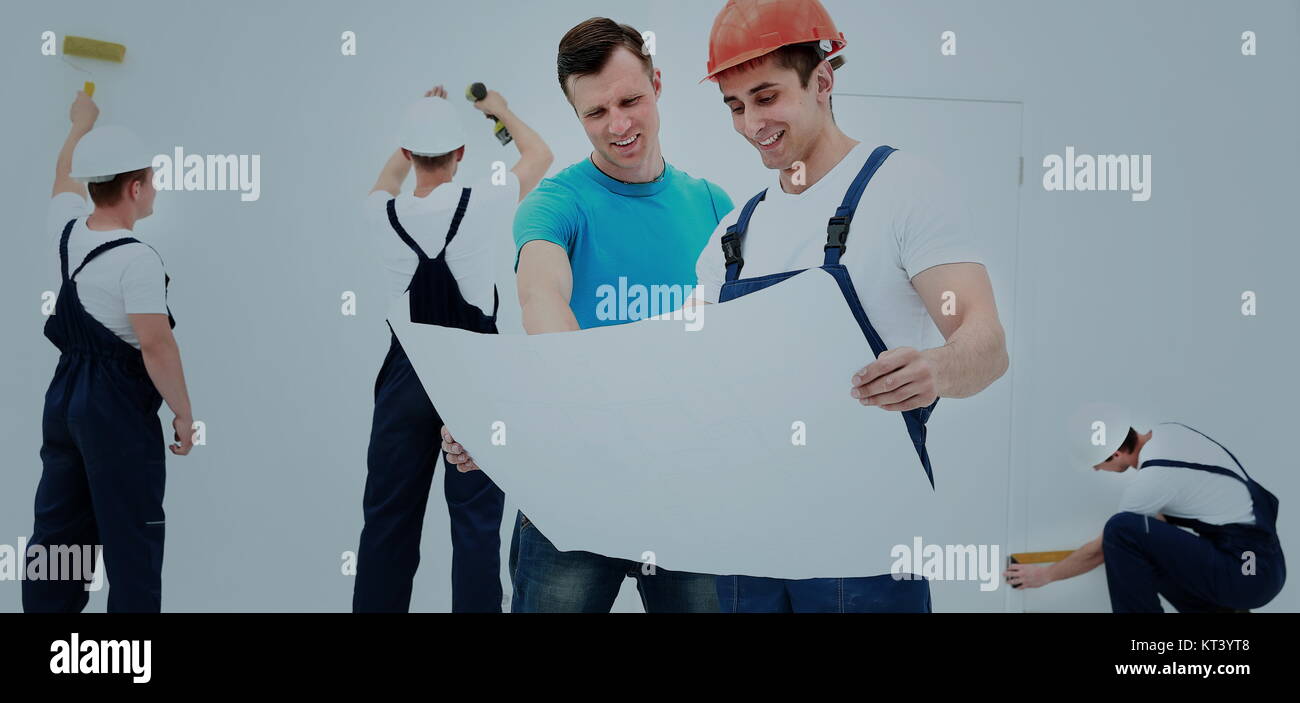 Architect and client discussing the plan of the building Stock Photo ...