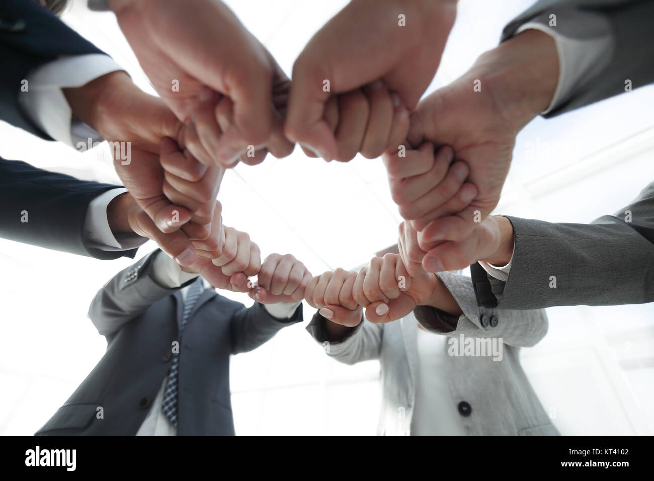 group of people joined their hands Stock Photo - Alamy
