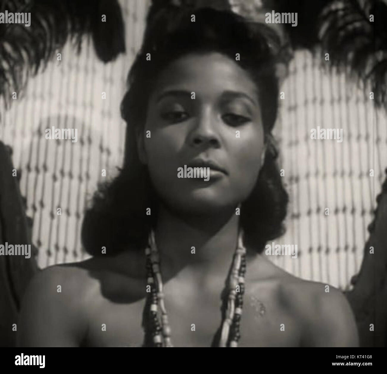 Promotional image featuring actress Kim Hamilton in the trailer for 'The Leech Woman' (1960), a ...