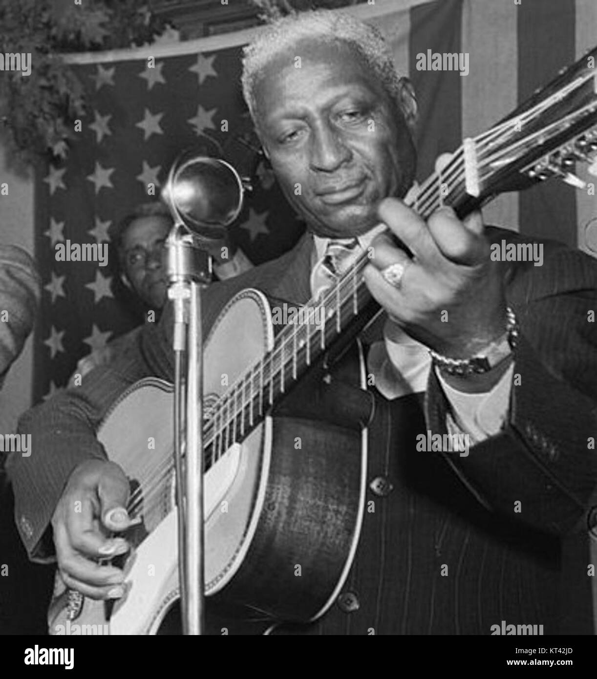 Lead Belly, a famous American blues musician, is captured in this ...