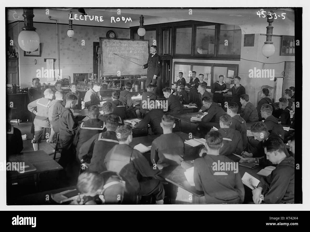 This photograph captures a lecture room, likely from the mid-20th ...