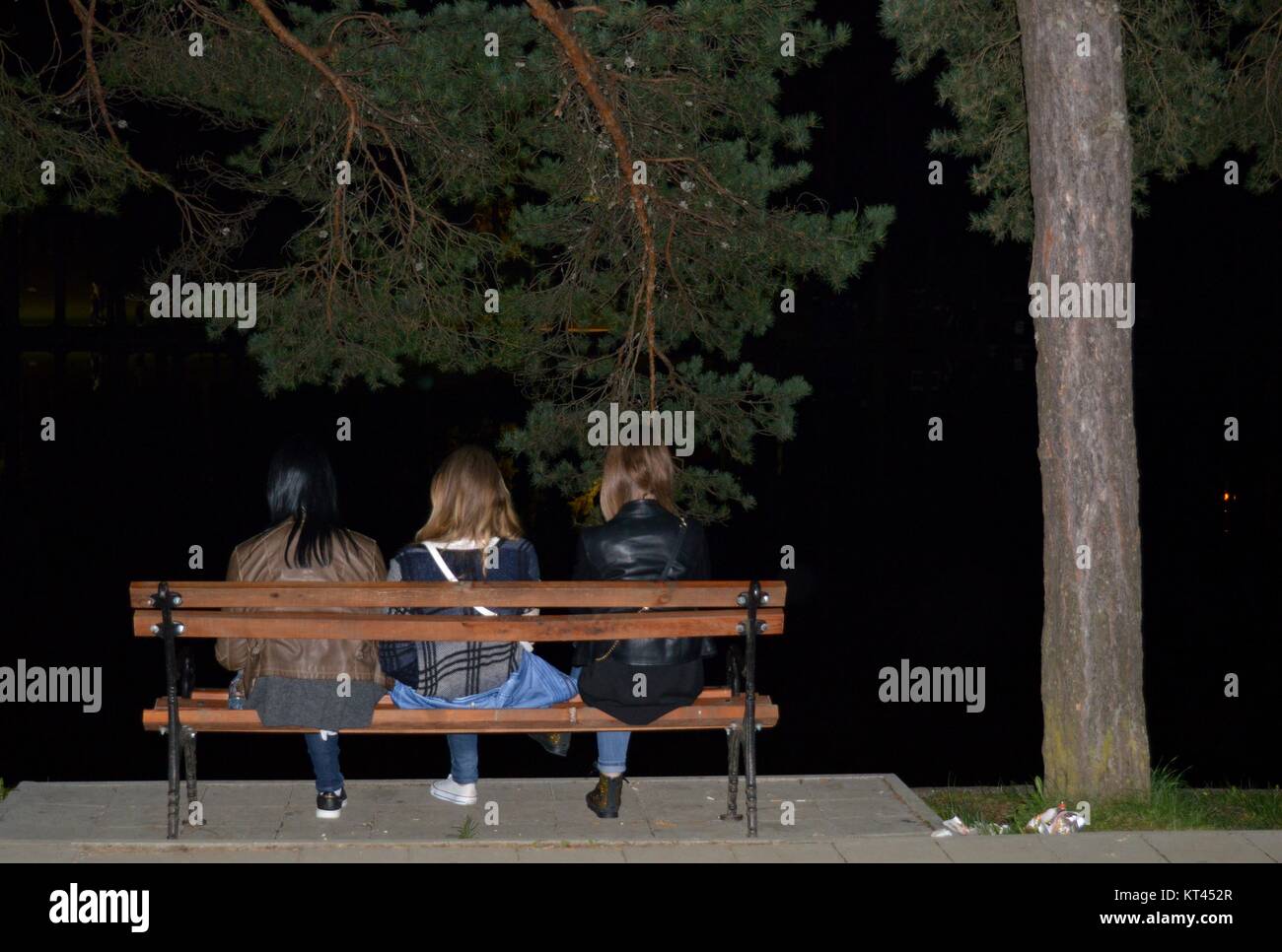 girls on the bench Stock Photo - Alamy