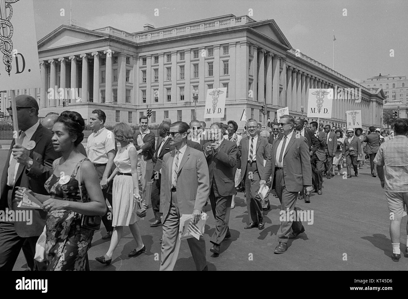 This photograph depicts marchers participating in a Civil Rights ...