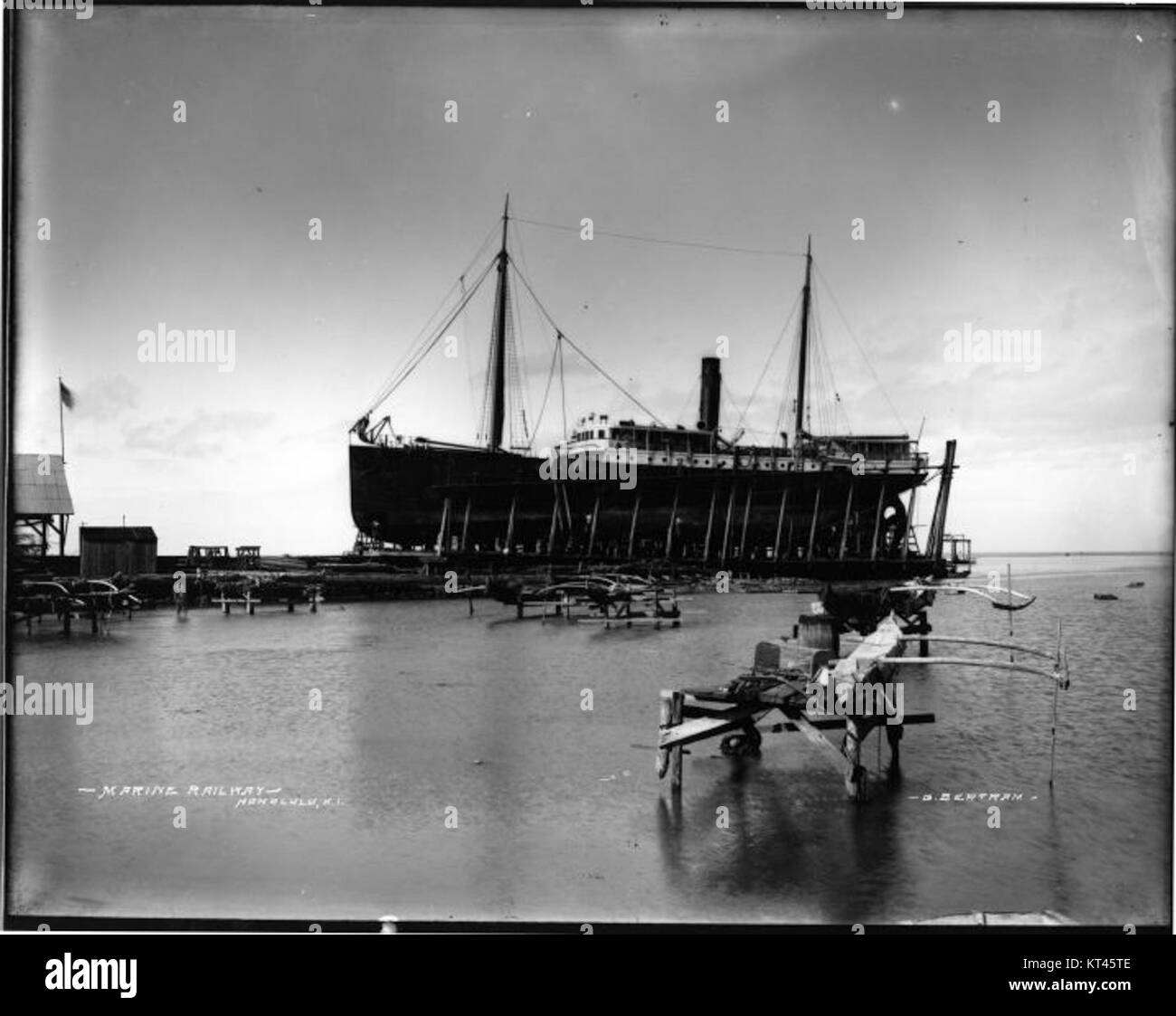 A historical photograph by Brother Bertram showing a marine railway, a ...