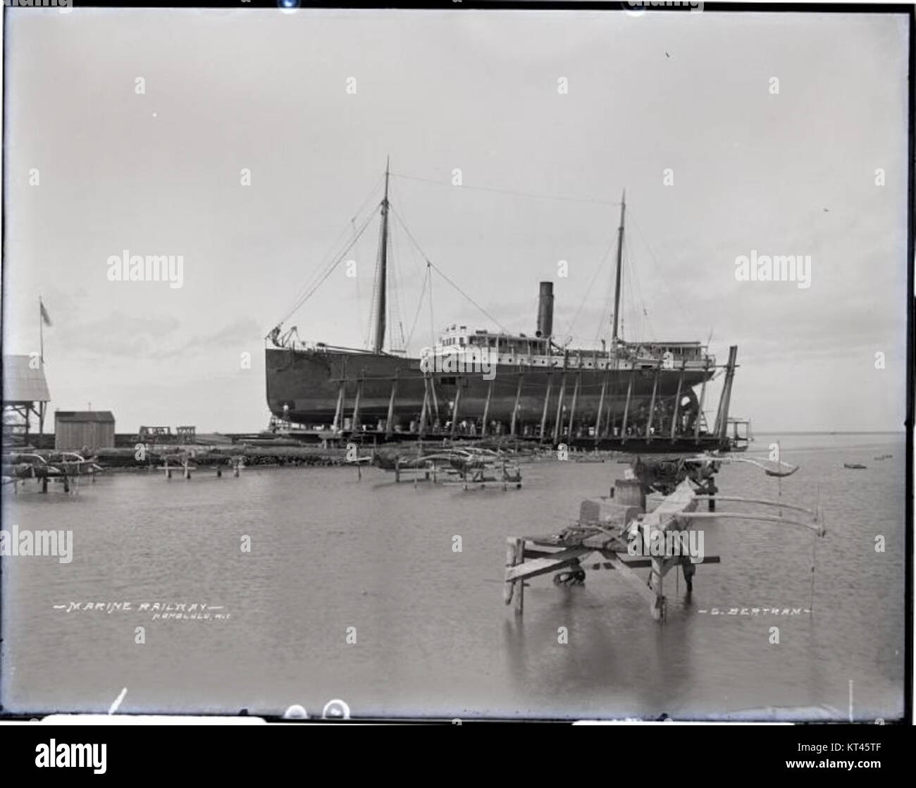 This photograph captures a marine railway system, showcasing the ...