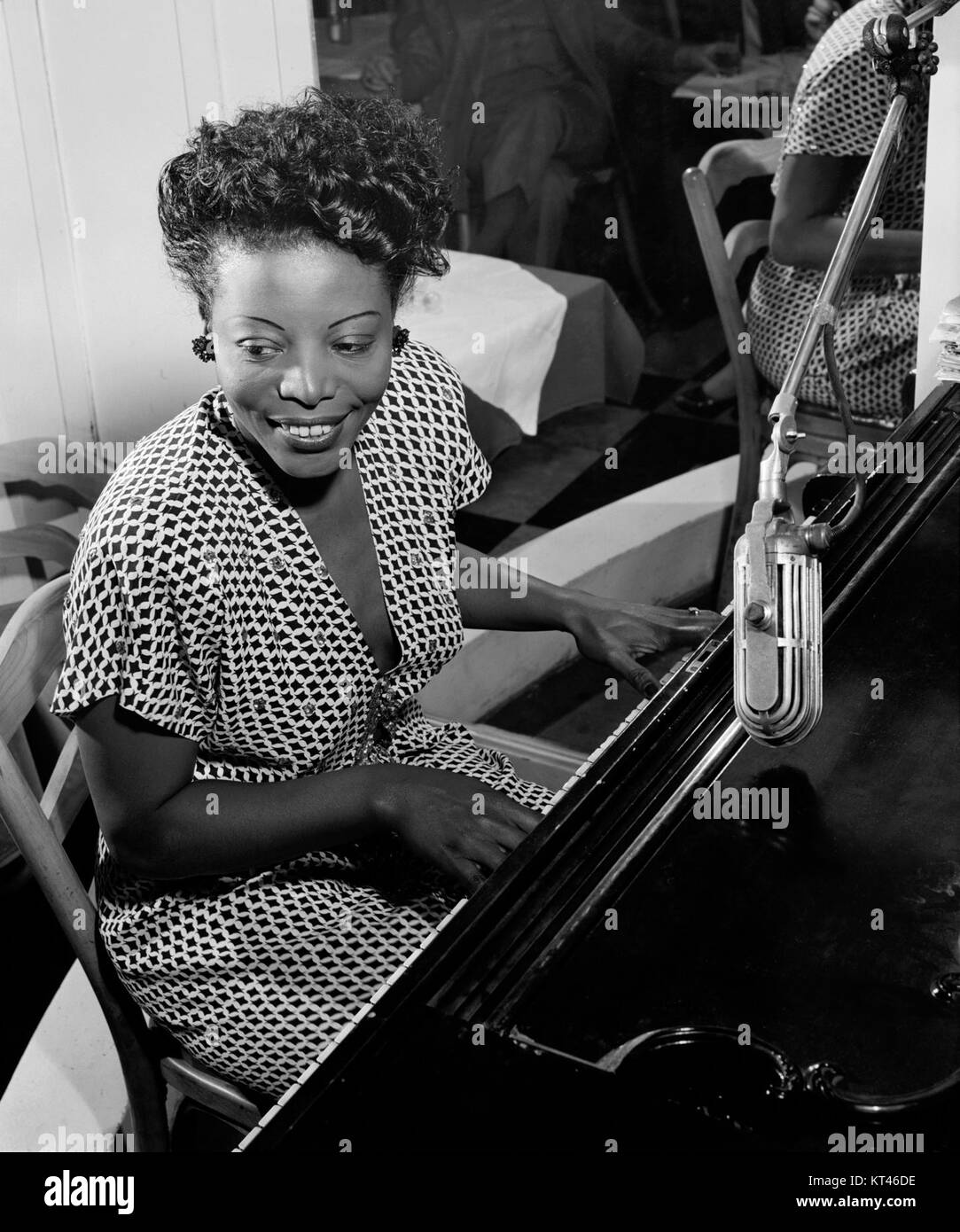 This image features Mary Lou Williams, an influential American jazz ...